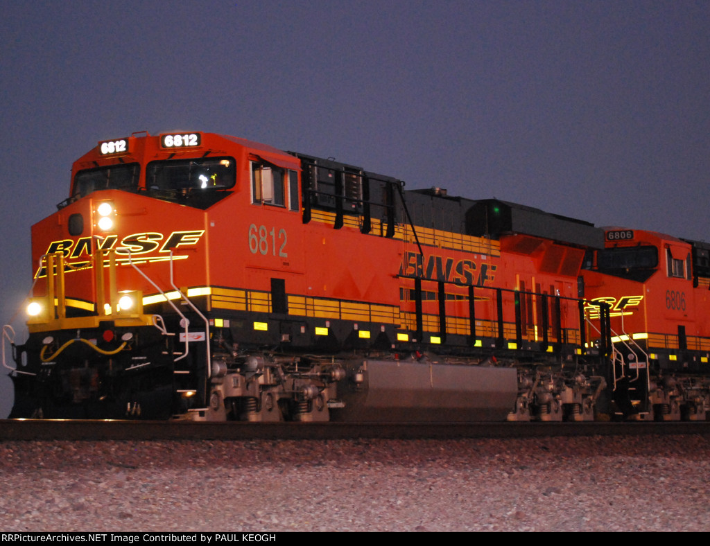 Zoom in shot of Two Very, Very Brand New ES44C4's at Sunrise in Barstow as BNSF 6812 and BNSF ...